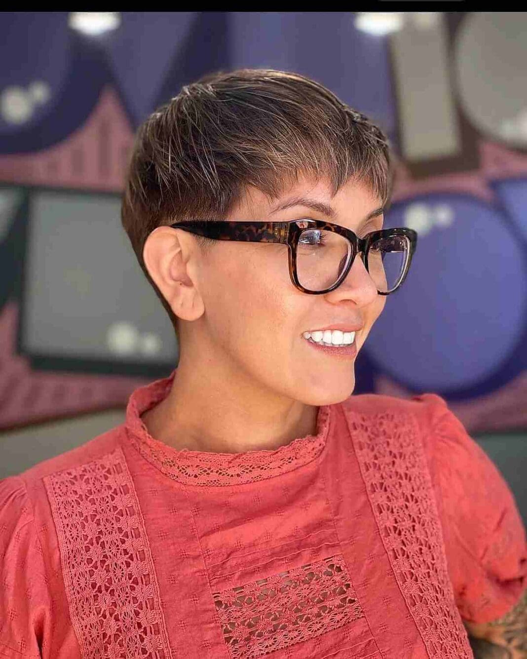 39 Modern Pixie Cut with Bangs for a Face-Framing Effect